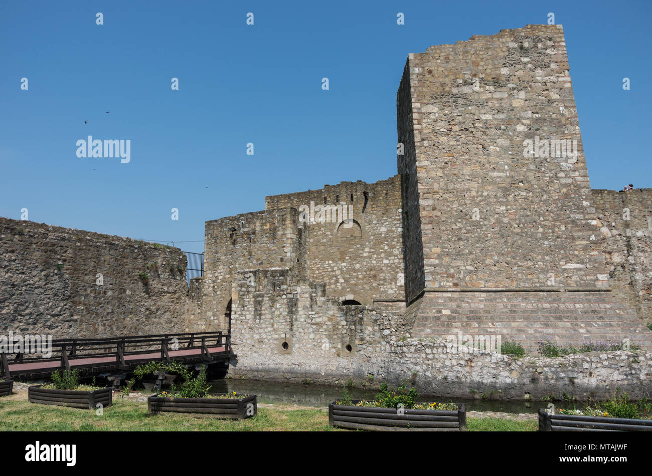 Wall, moat, towers and entrance gate of Smederevo Fortress is a ...