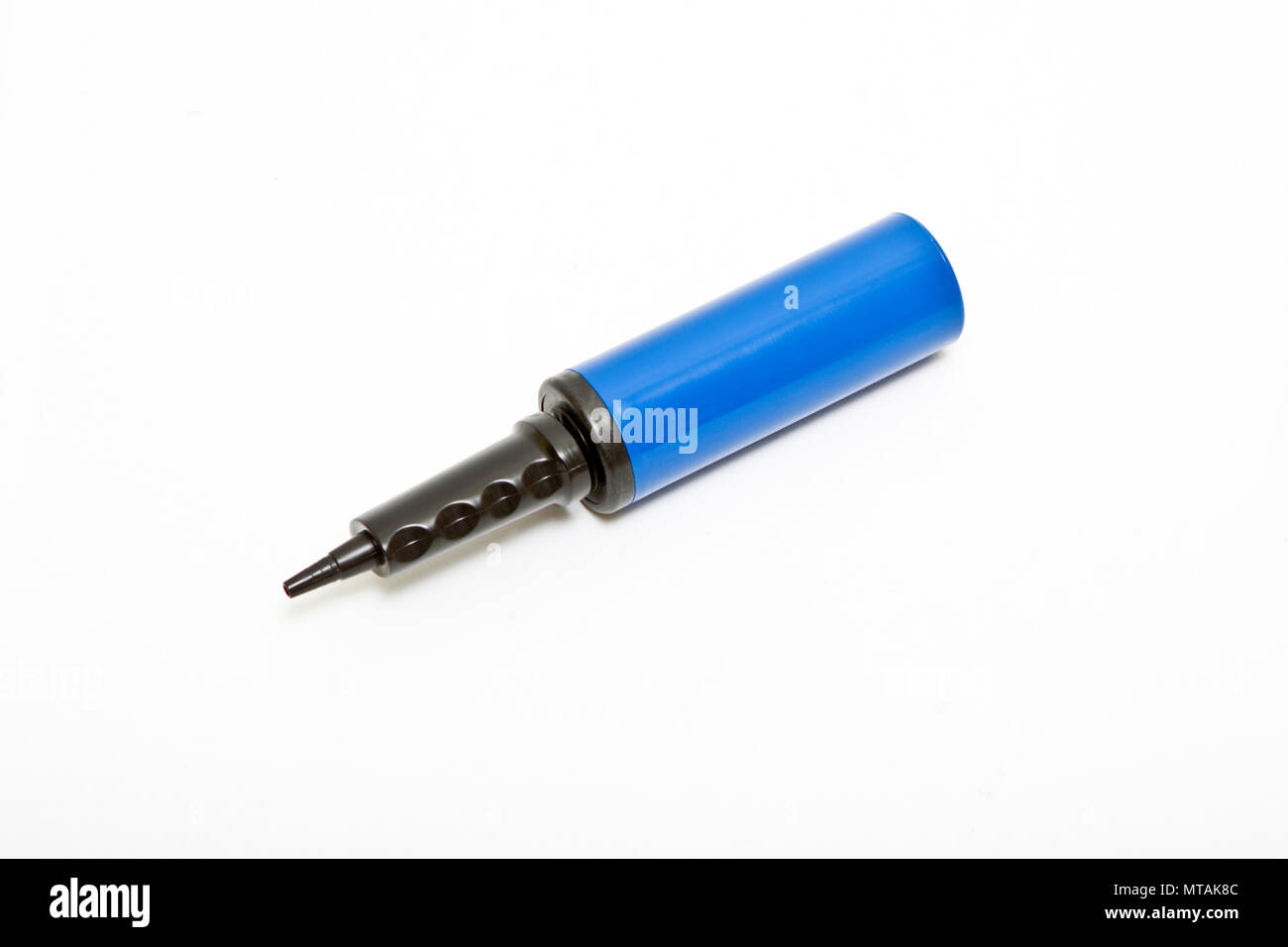 Plastic air pump for pumping balls on a white background Stock Photo ...
