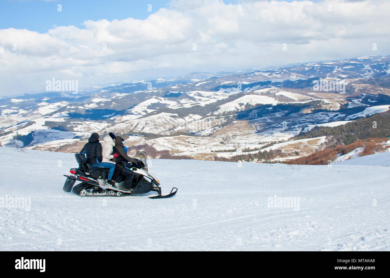 Women riding snowmobile hi-res stock photography and images - Alamy