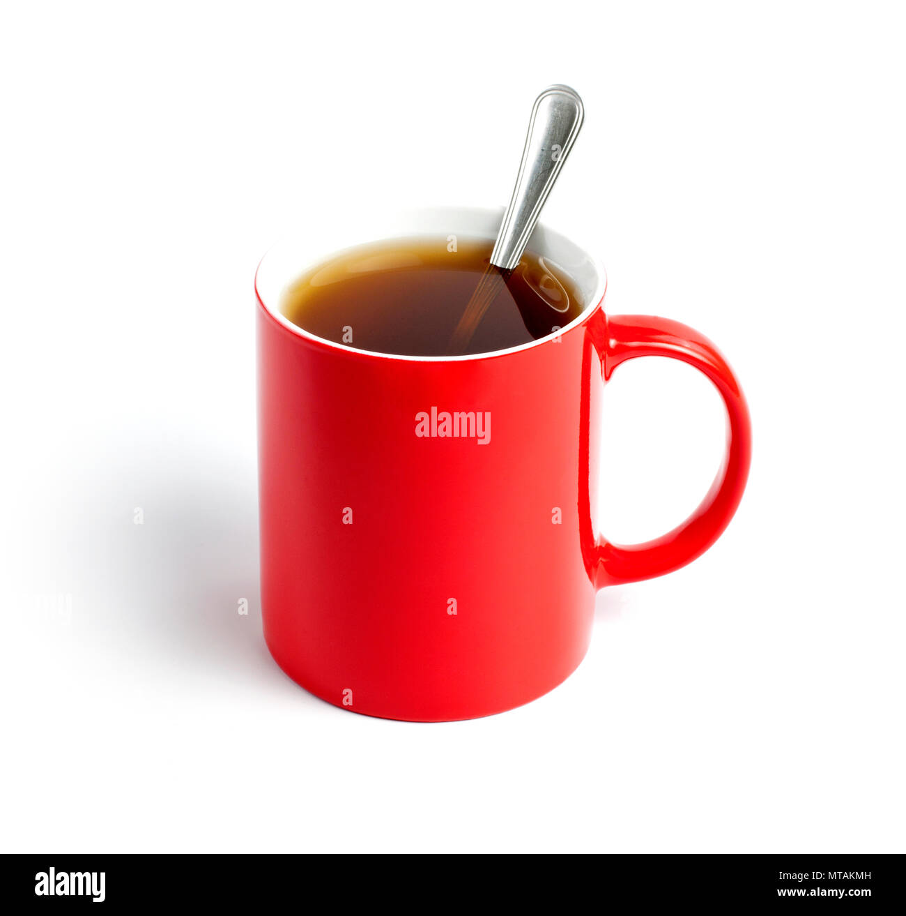Red cup of tea with spoon on white background Stock Photo - Alamy