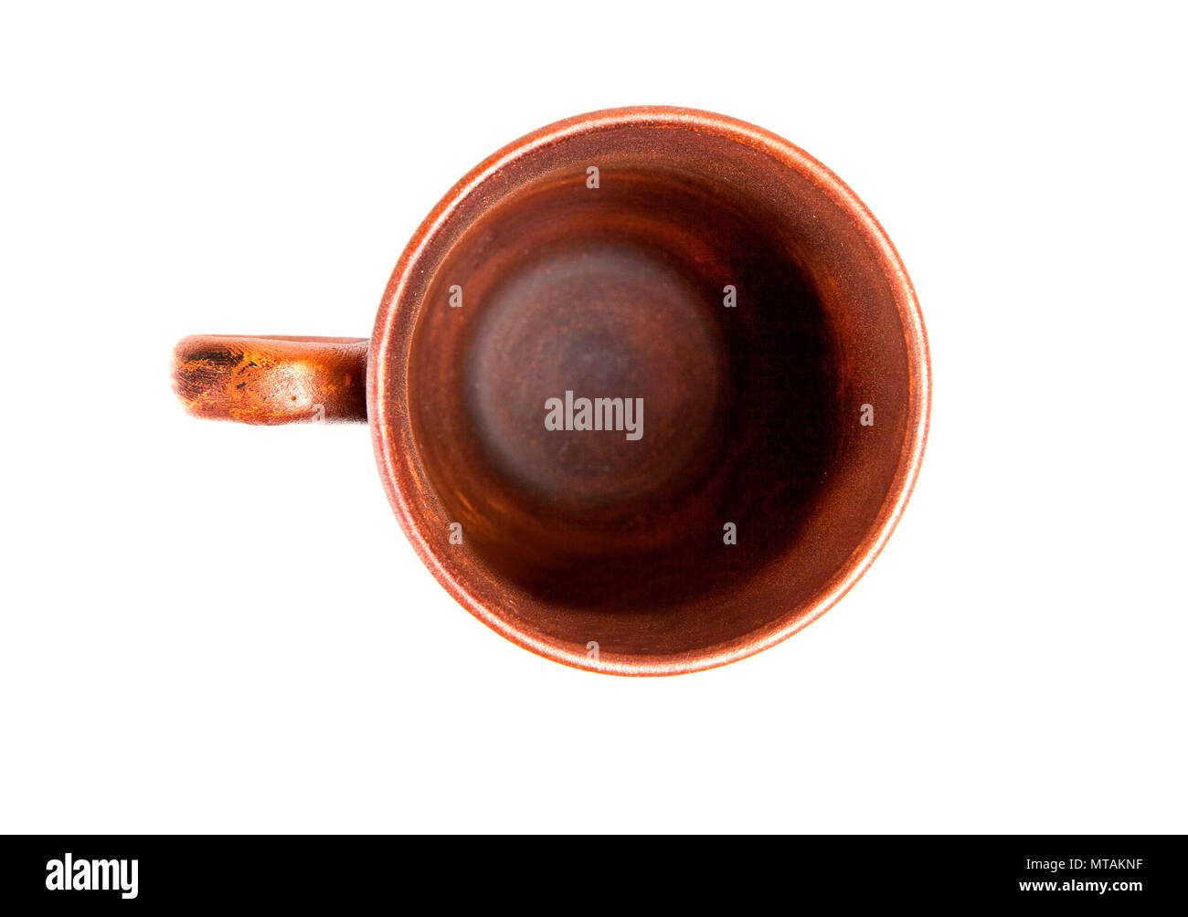 Empty brown mug on a white background. Top view Stock Photo - Alamy