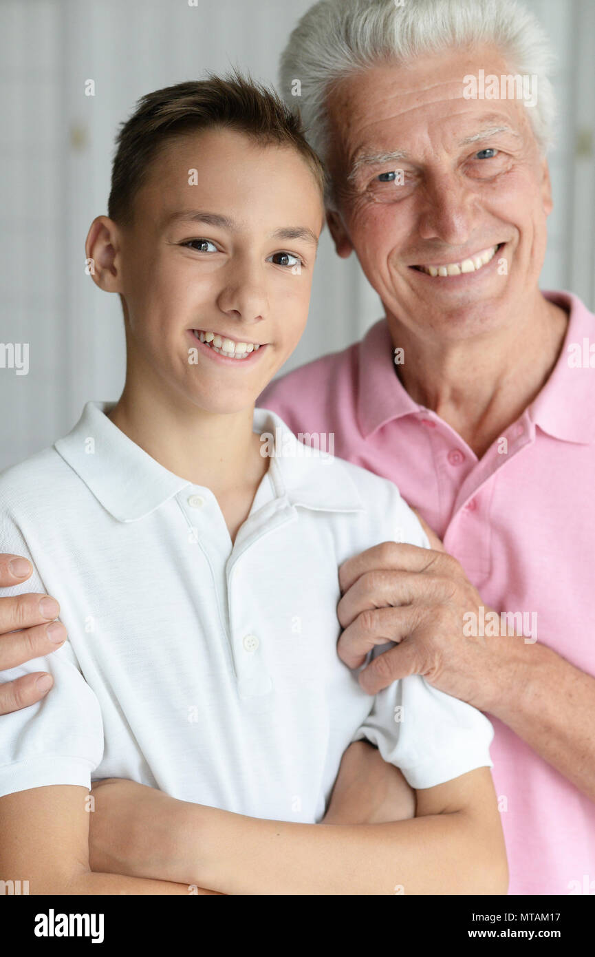 smiling grandfather and grandson Stock Photo - Alamy