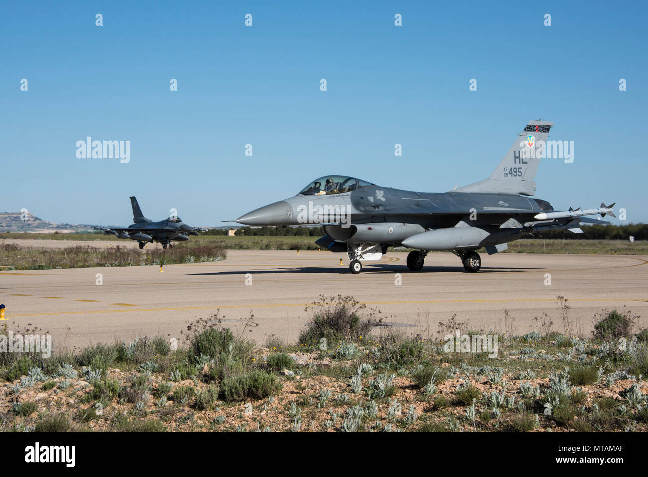 F-16 Fighting Falcons from Hill Air Force Base, Utah, taxi down the ...