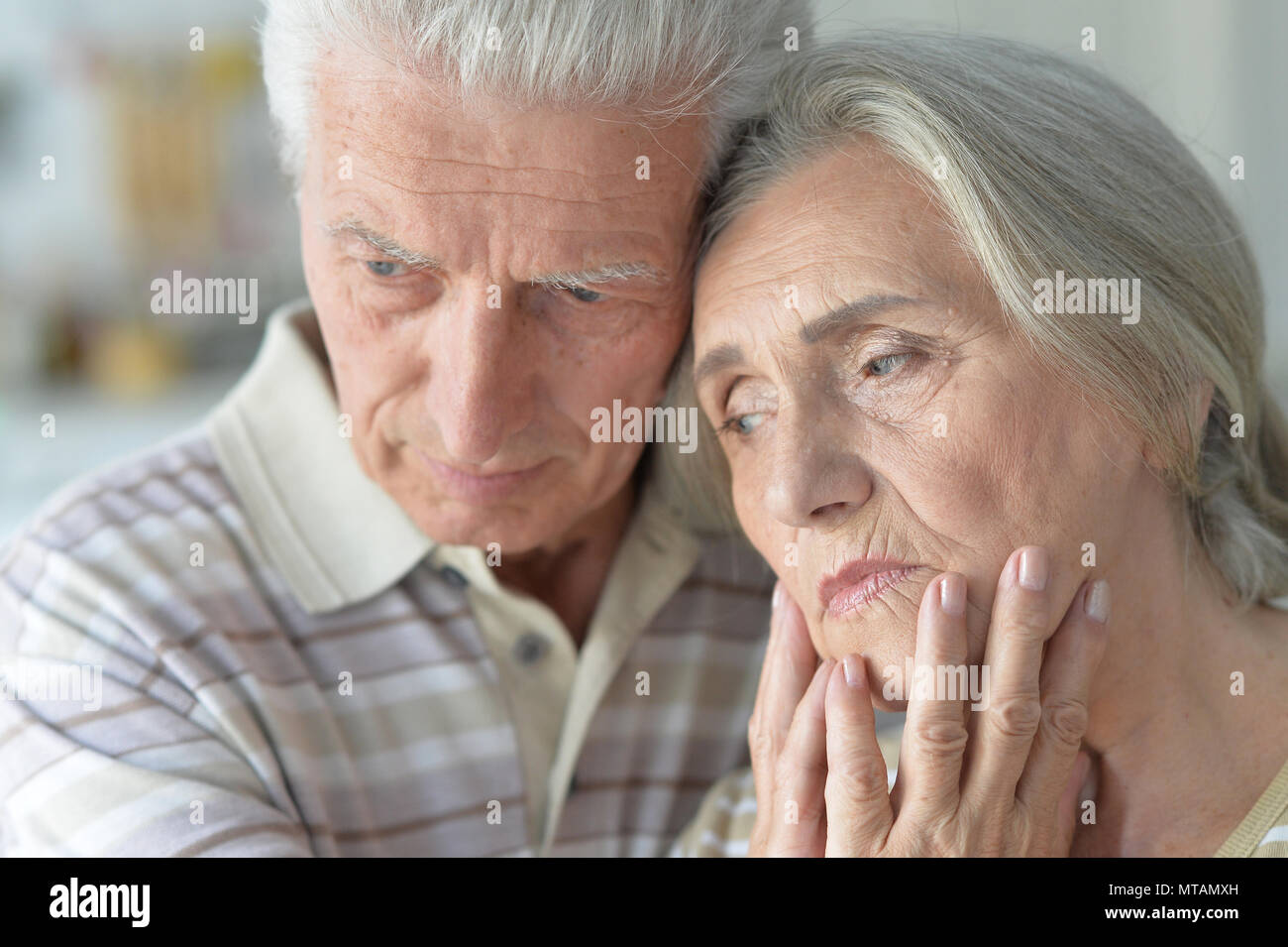 Sad Senior couple Stock Photo - Alamy