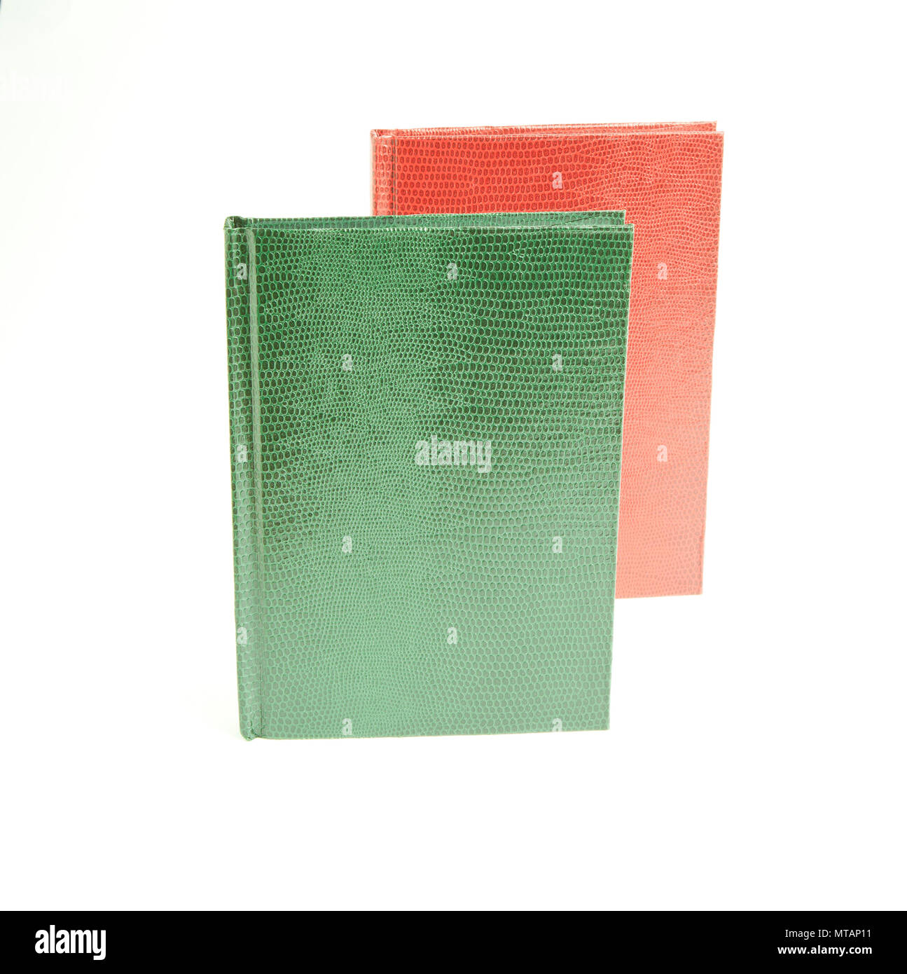 green and red books in leather cover on a white background, Snake Cover ...