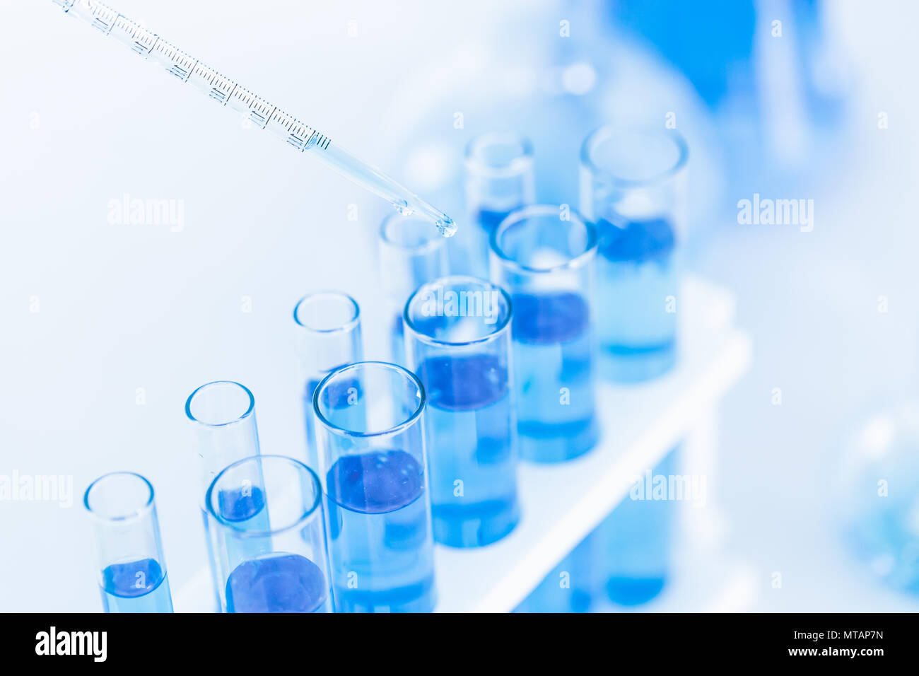 science chemical test tube with blue medical liquid inside drop test ...