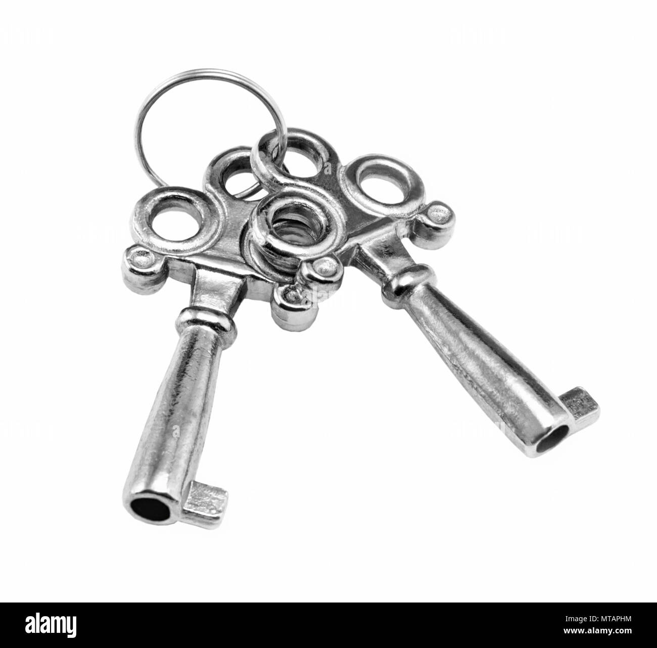 Silver keys isolated on white background Stock Photo - Alamy