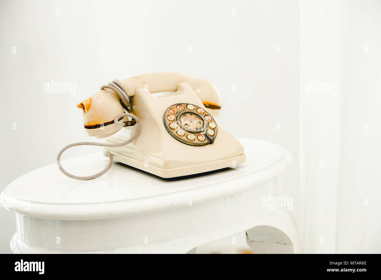 Vintage telephone old telephone on white room background Stock Photo ...