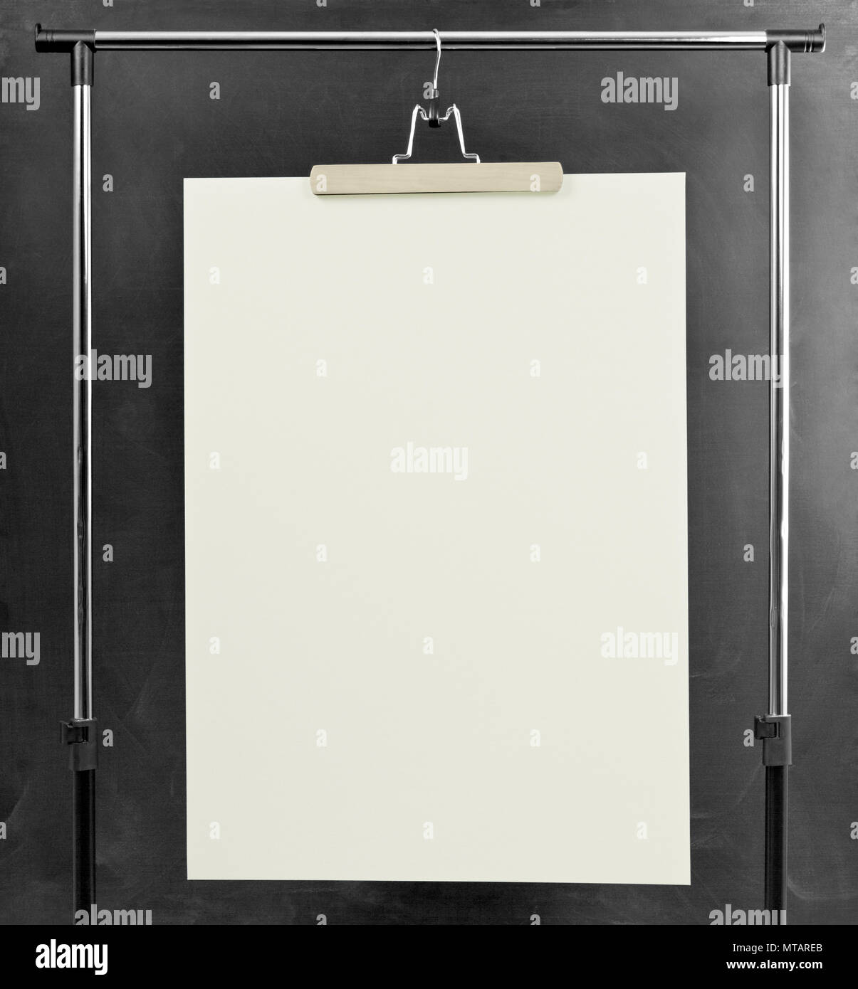 White poster hanging at a clothes rack Stock Photo - Alamy