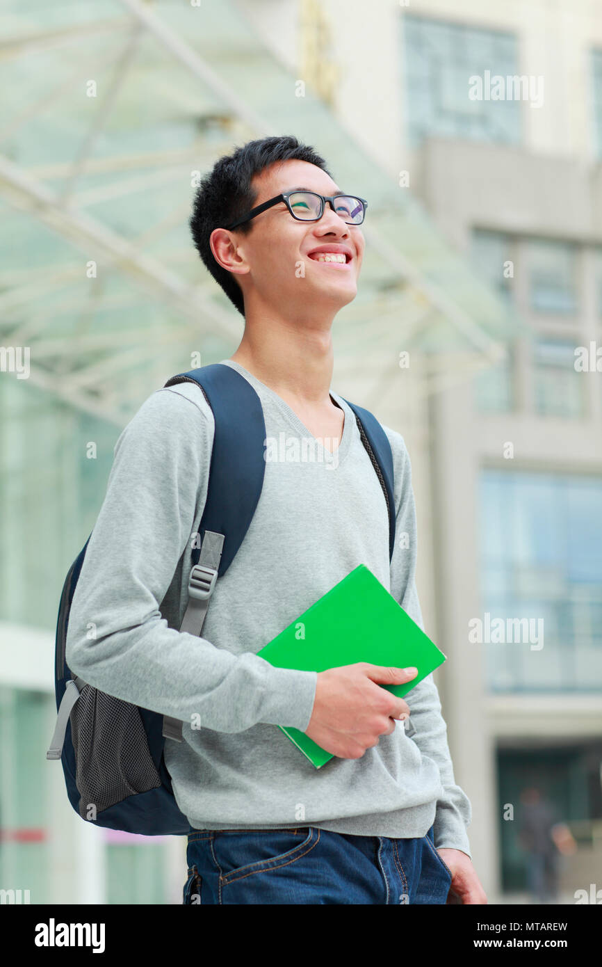 one happy confident young Chinese college student in campus Stock Photo ...
