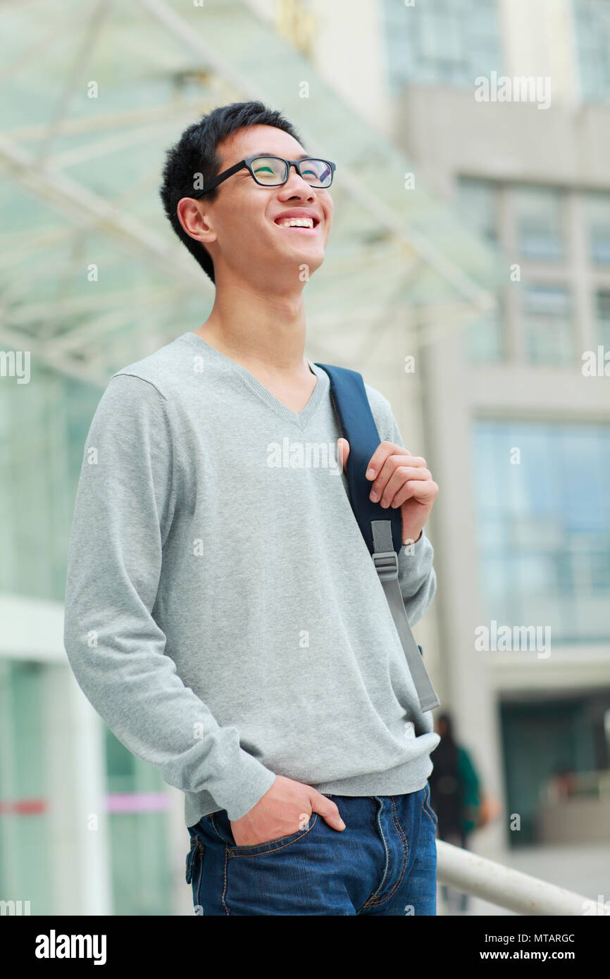 one happy confident young Chinese college student in campus Stock Photo ...