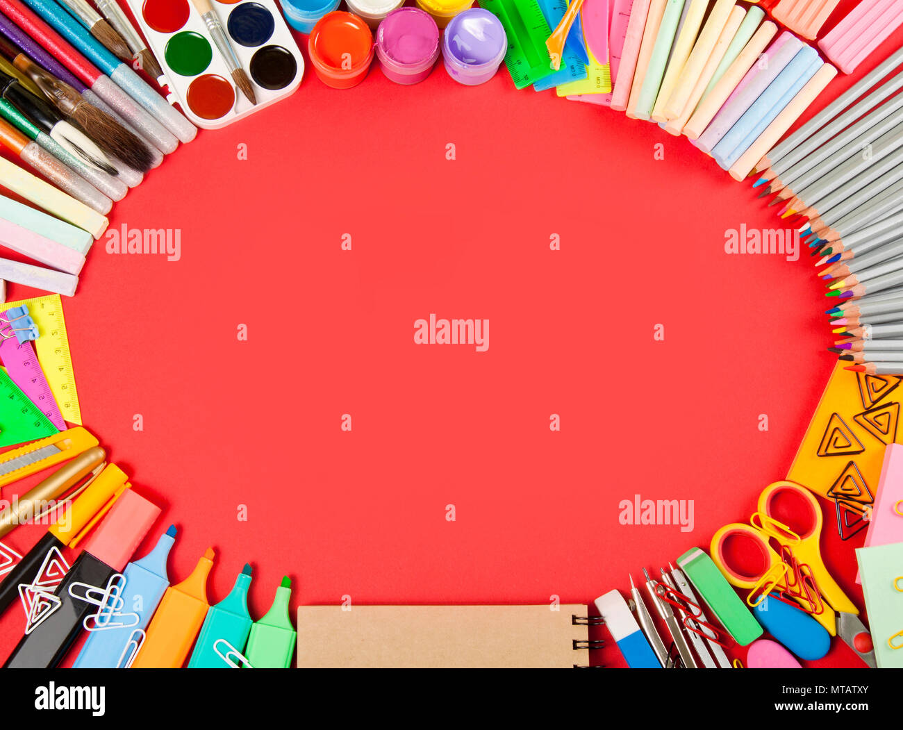 School supplies frame on a red background Stock Photo - Alamy