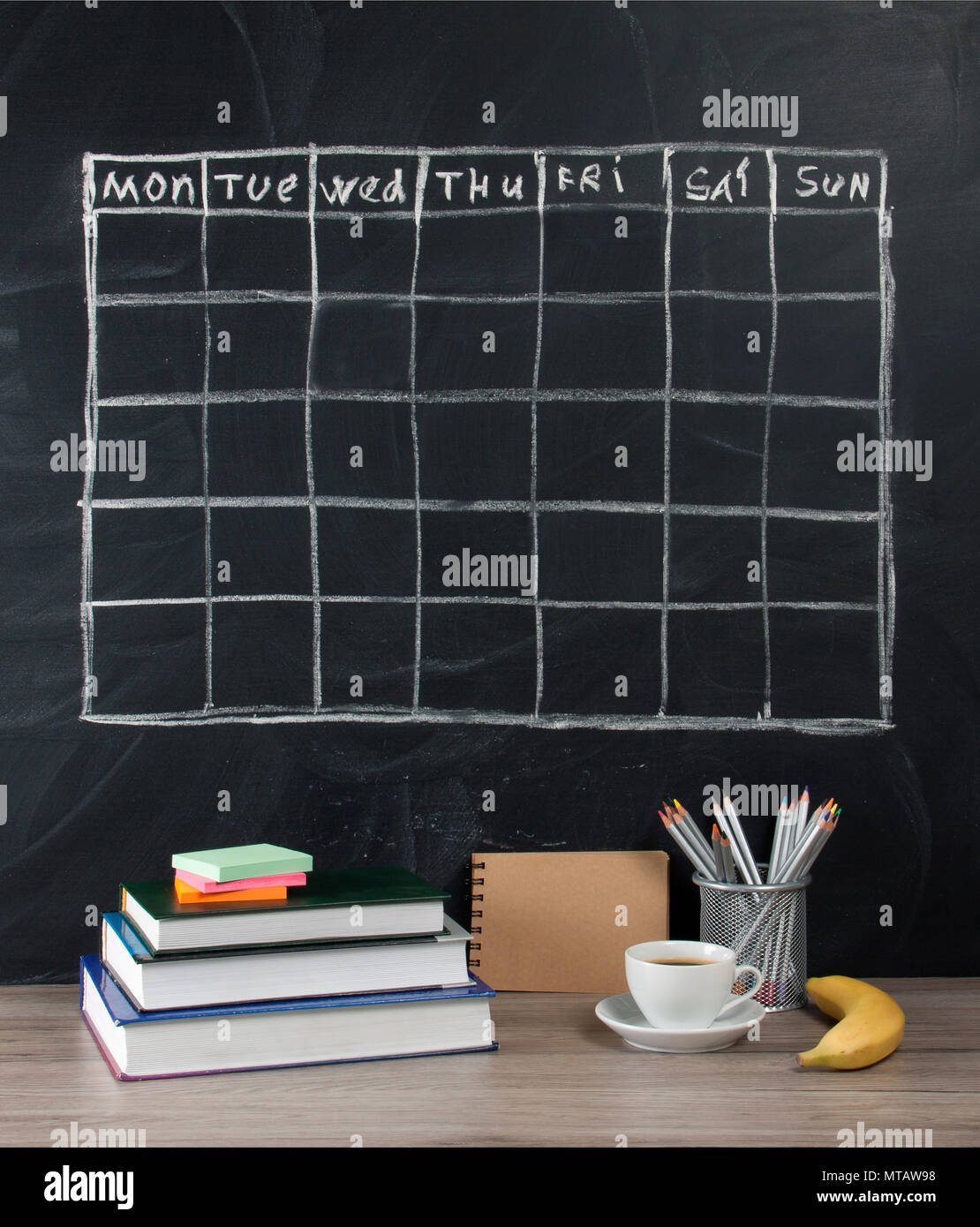 Grid timetable schedule on black chalkboard background Stock Photo - Alamy