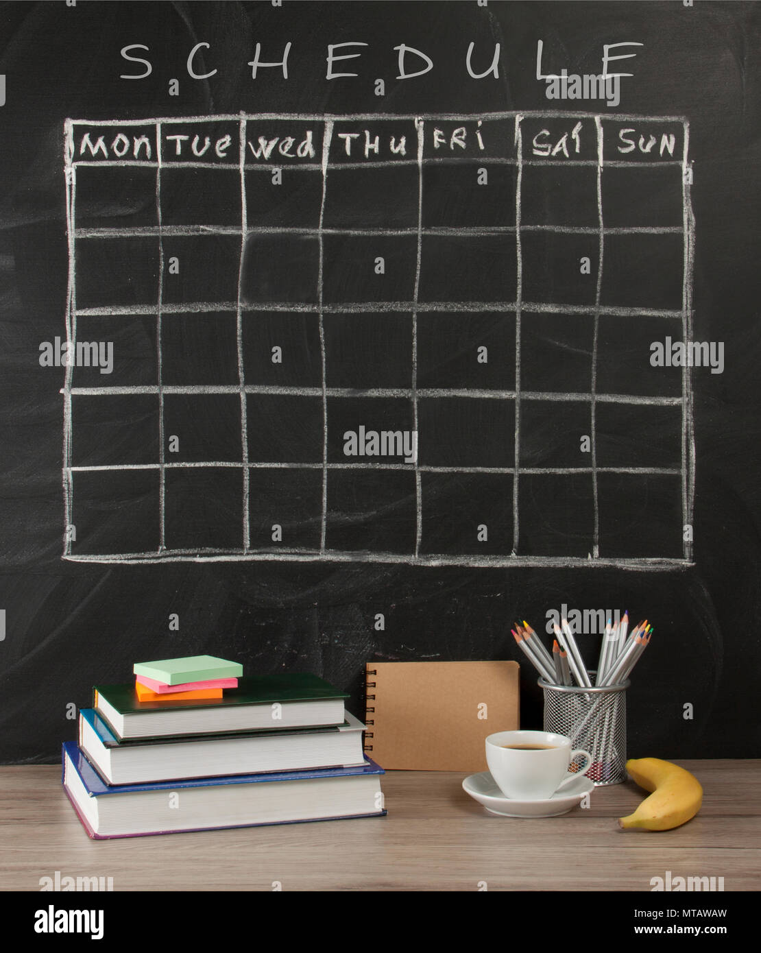Grid timetable schedule on black chalkboard background Stock Photo - Alamy