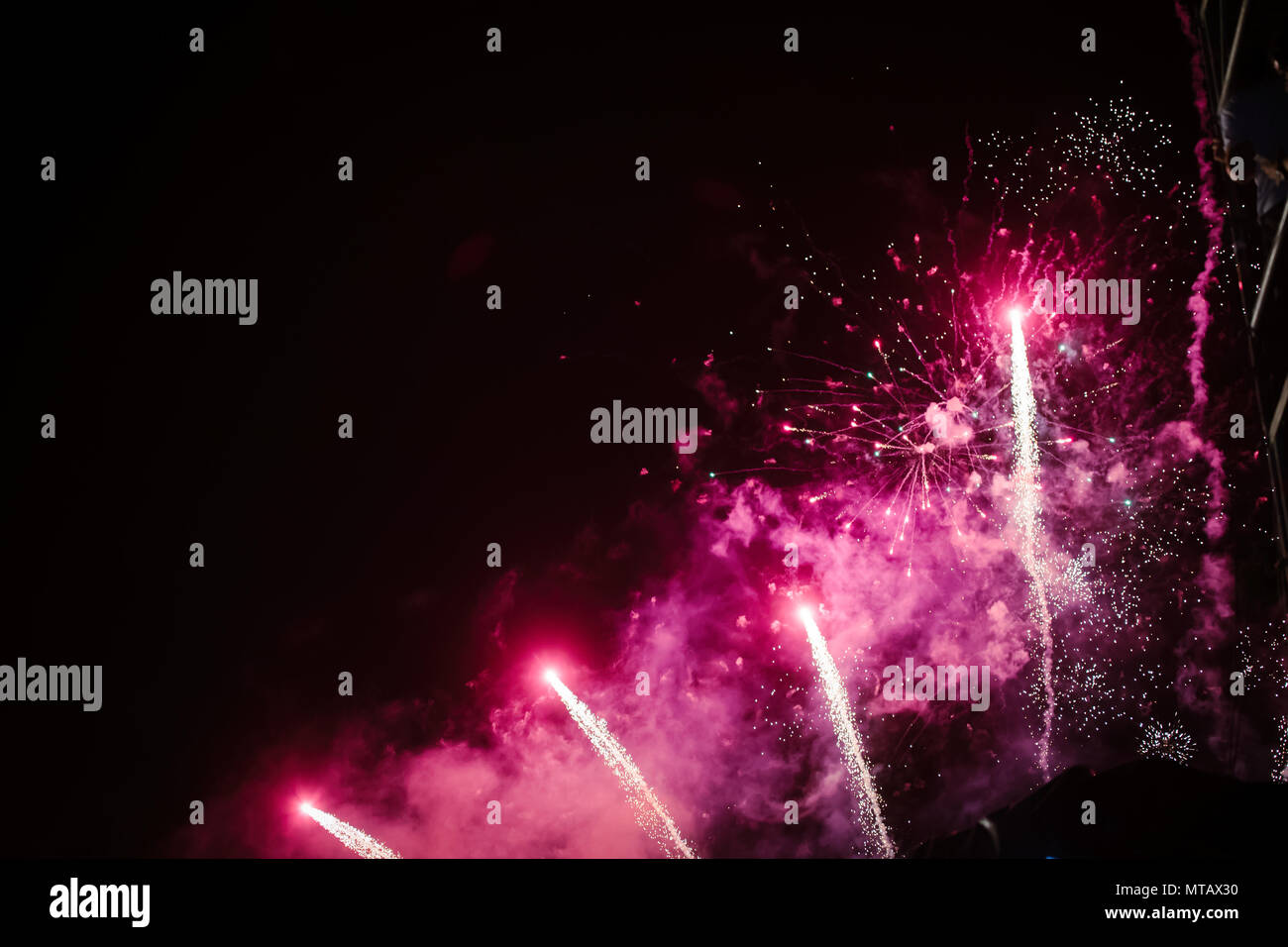 Portrait of large fireworks at music festival Stock Photo - Alamy