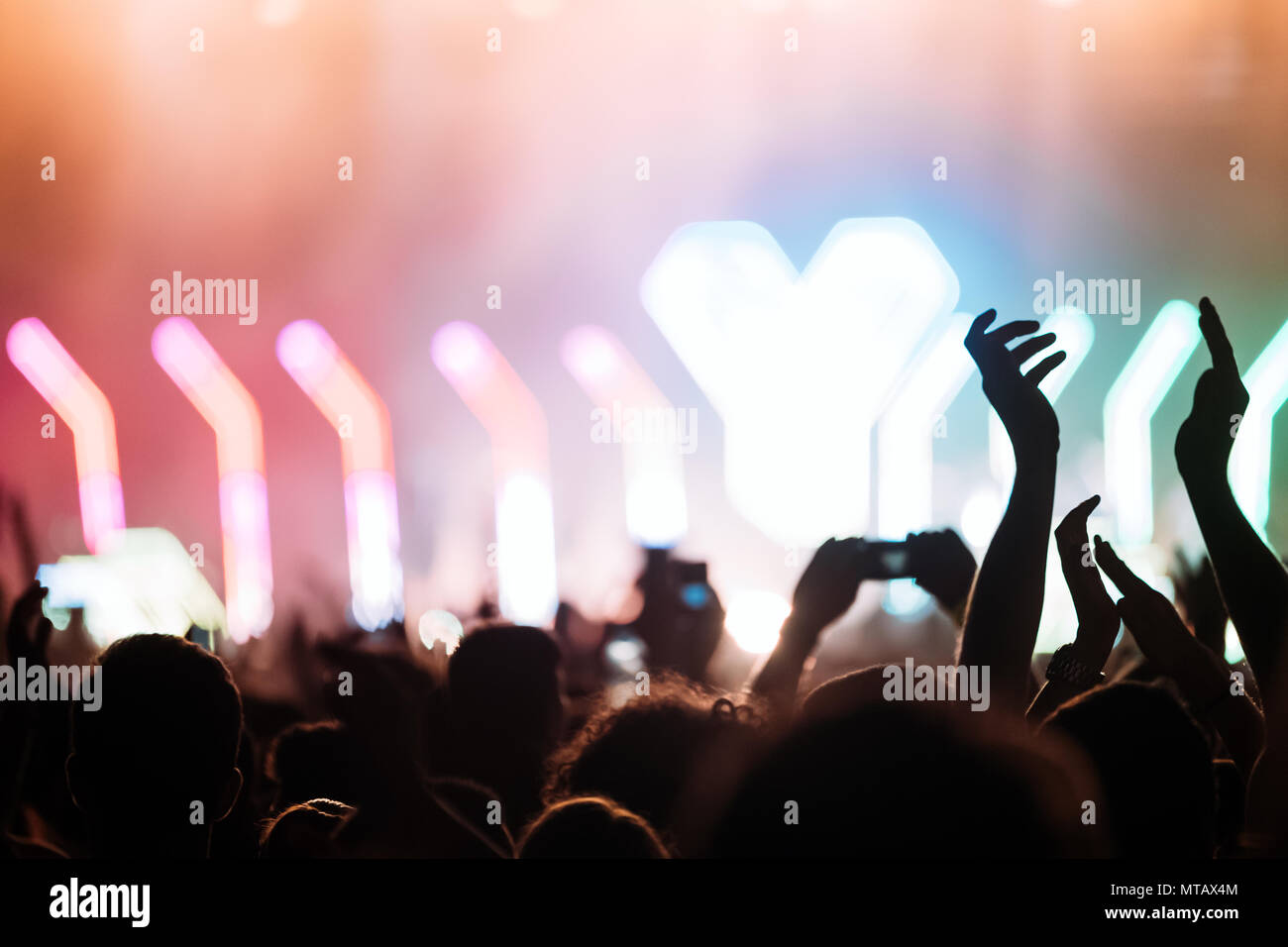 Picture of dancing crowd at music festival Stock Photo - Alamy