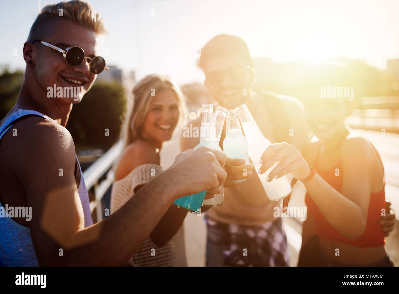 Group of young friends having fun together Stock Photo - Alamy