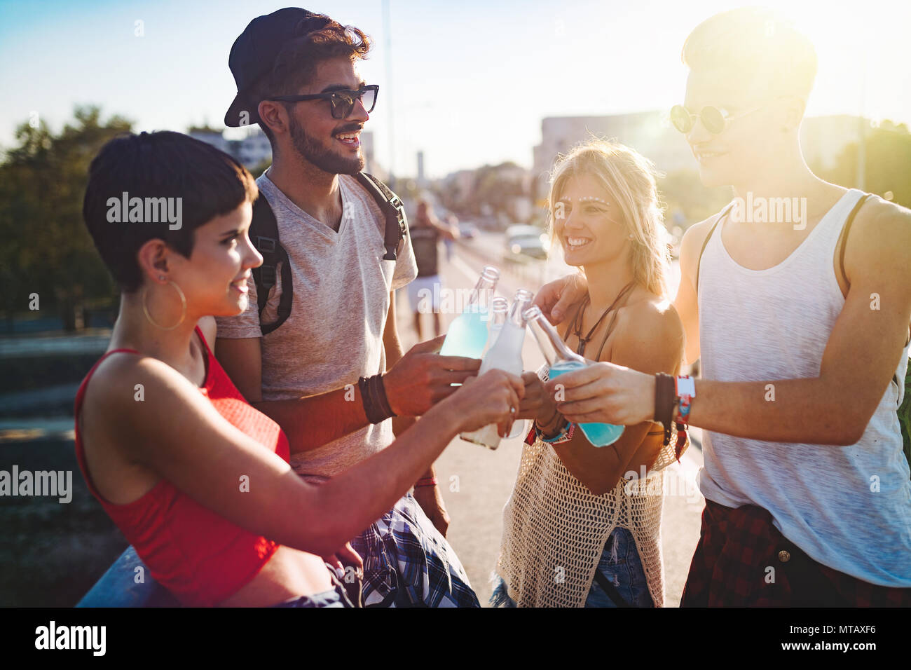 Group of young friends having fun together Stock Photo - Alamy