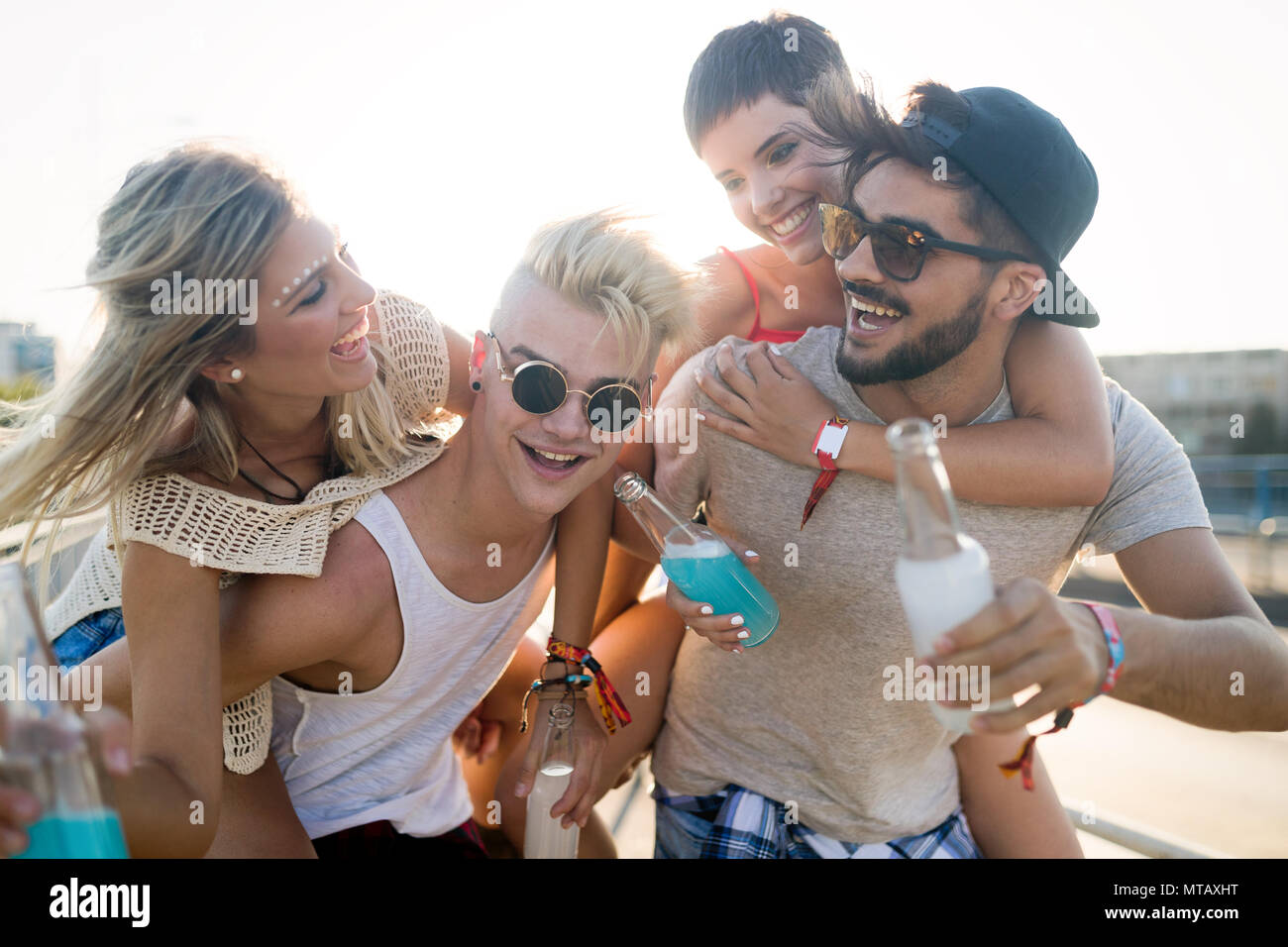 Group of young friends having fun together Stock Photo - Alamy