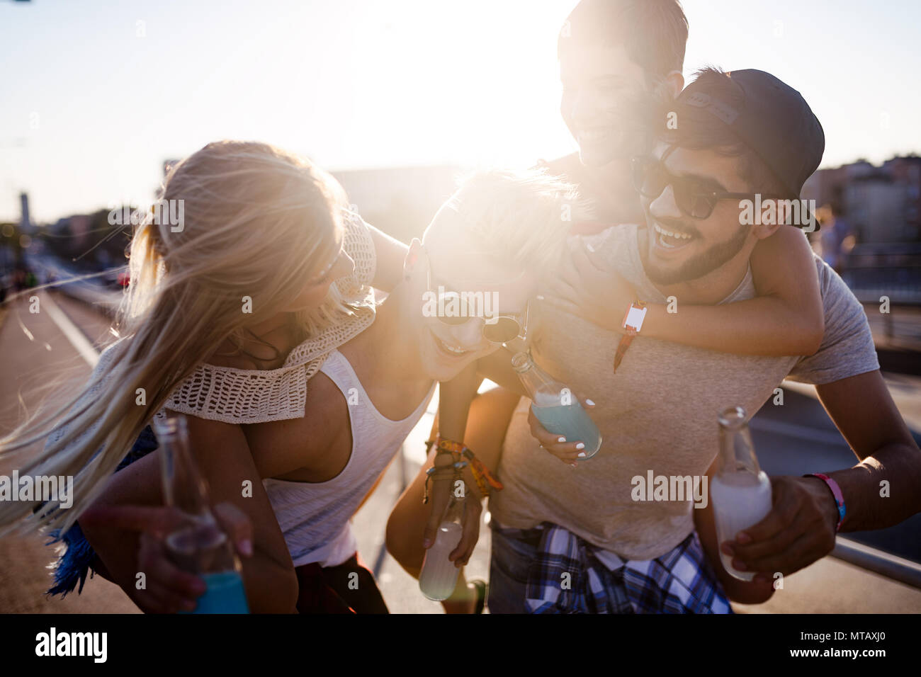 Group of young friends having fun together Stock Photo - Alamy