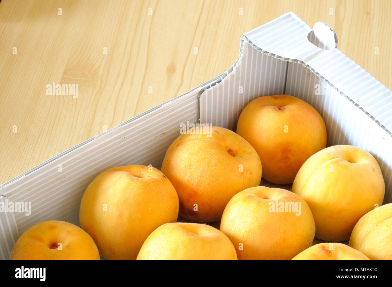 top view of fresh organic apricots in a box Stock Photo - Alamy