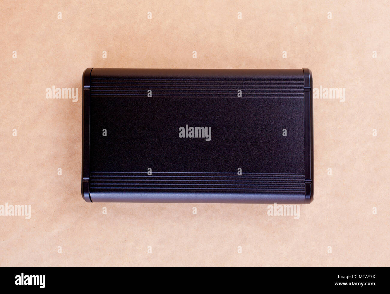 Top view of external computer hard disk drive on beige background Stock ...