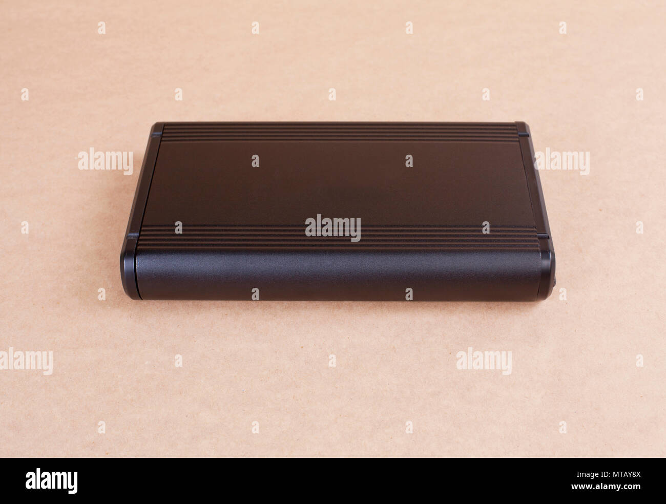 Top view of external computer hard disk drive on beige background Stock ...