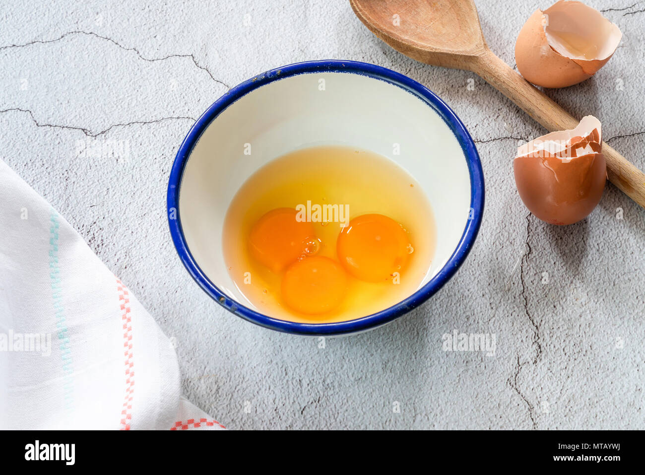 Three egg yolks in hi-res stock photography and images - Alamy