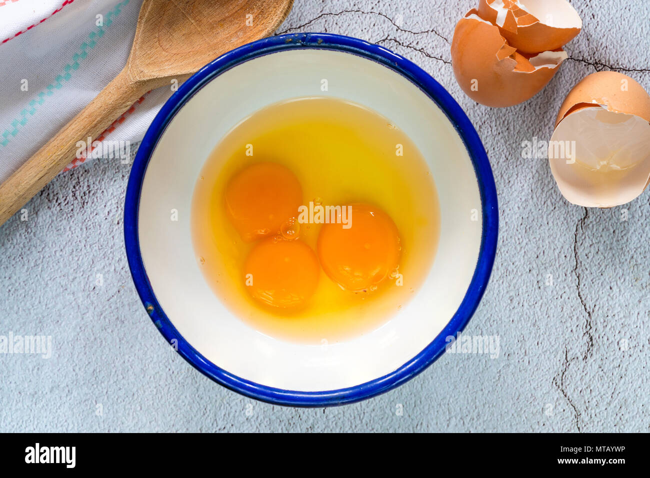 Three egg yolks in hi-res stock photography and images - Alamy