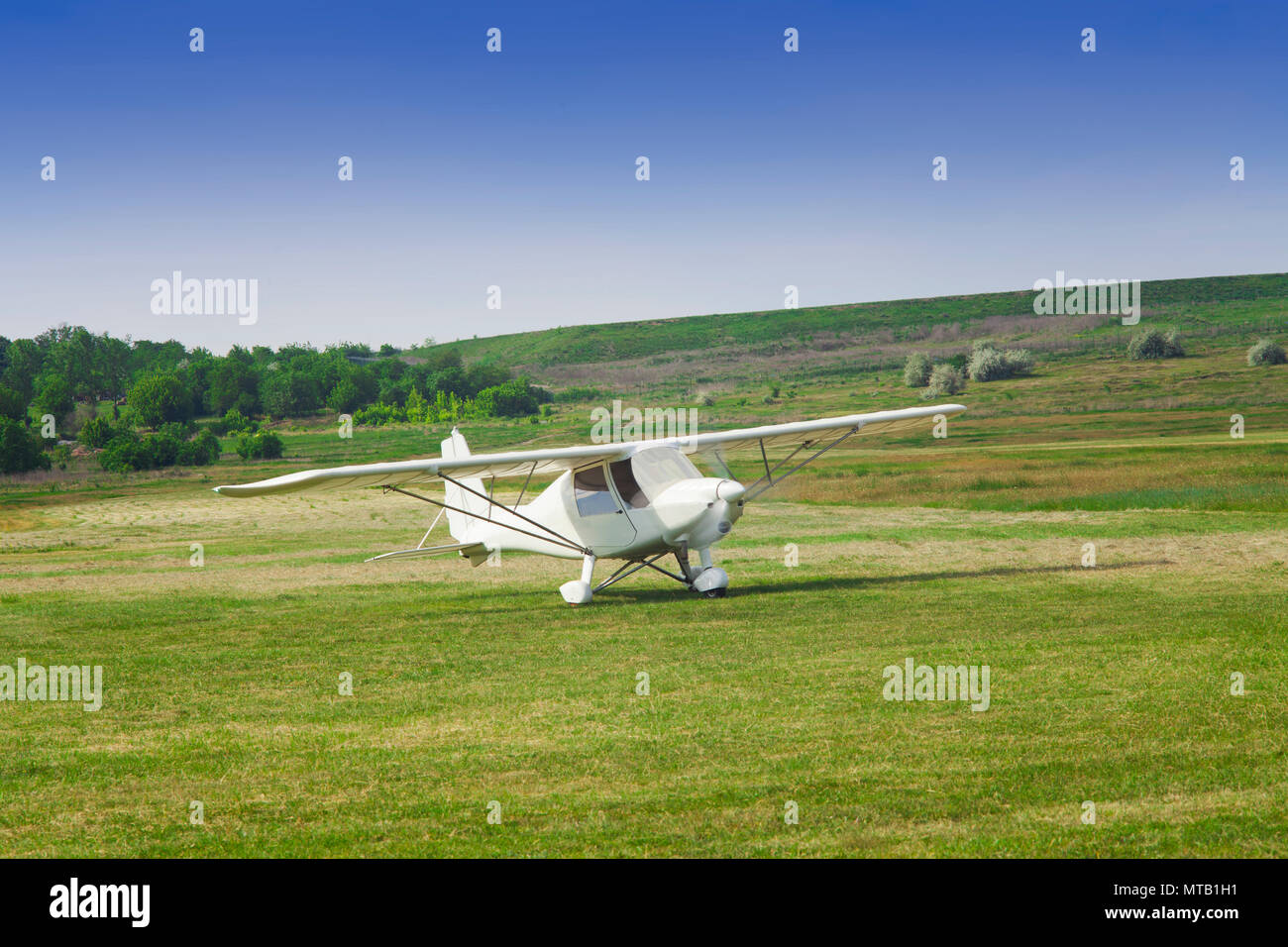 small airplane ready to take off on the airfield Stock Photo - Alamy