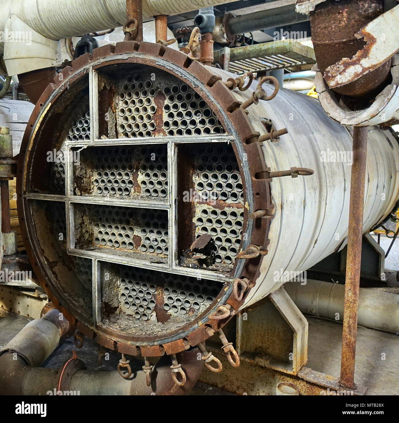 Large industrial boiler in a deserted factory building Stock Photo - Alamy
