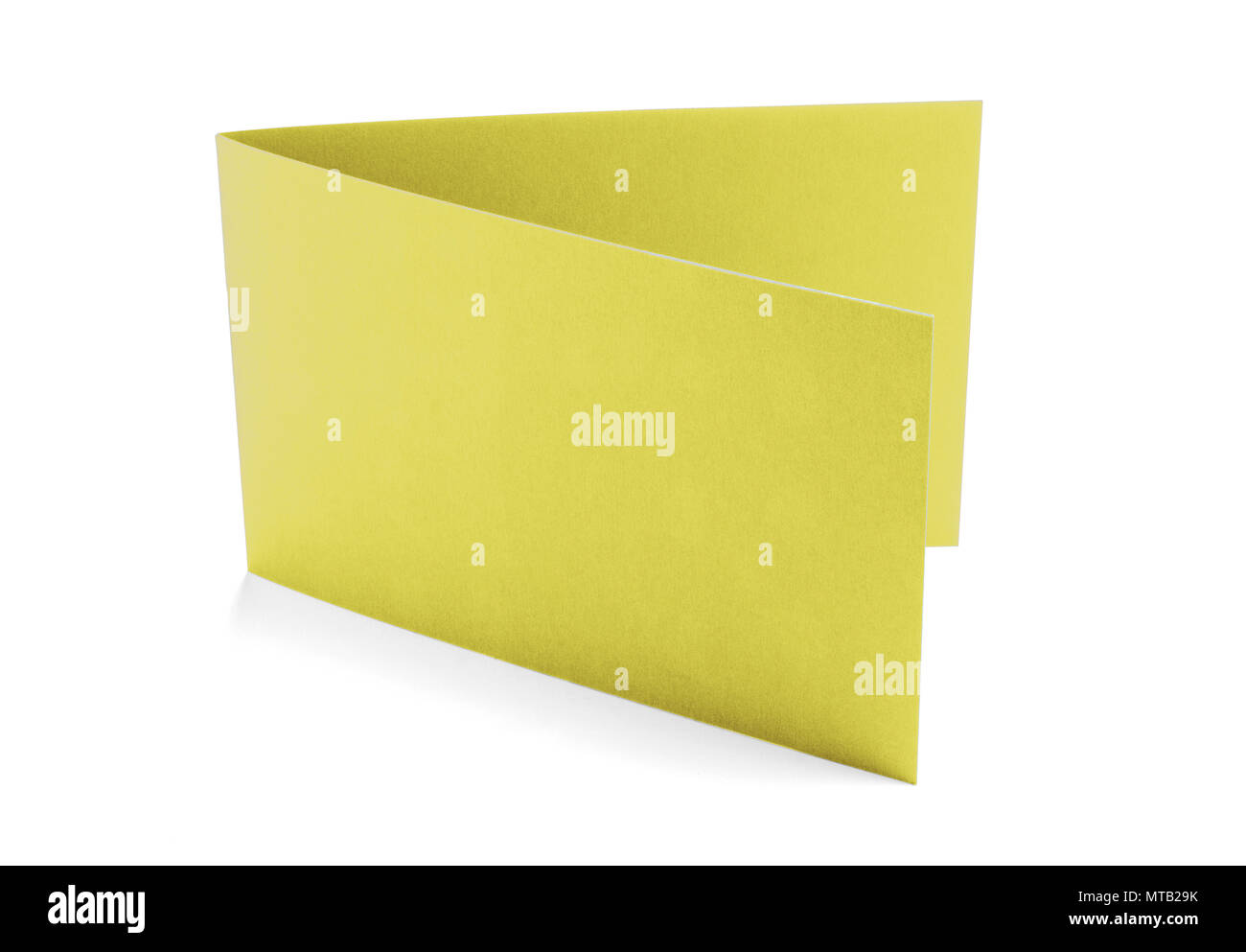 Mock up of yellow greeting card on white background Stock Photo - Alamy