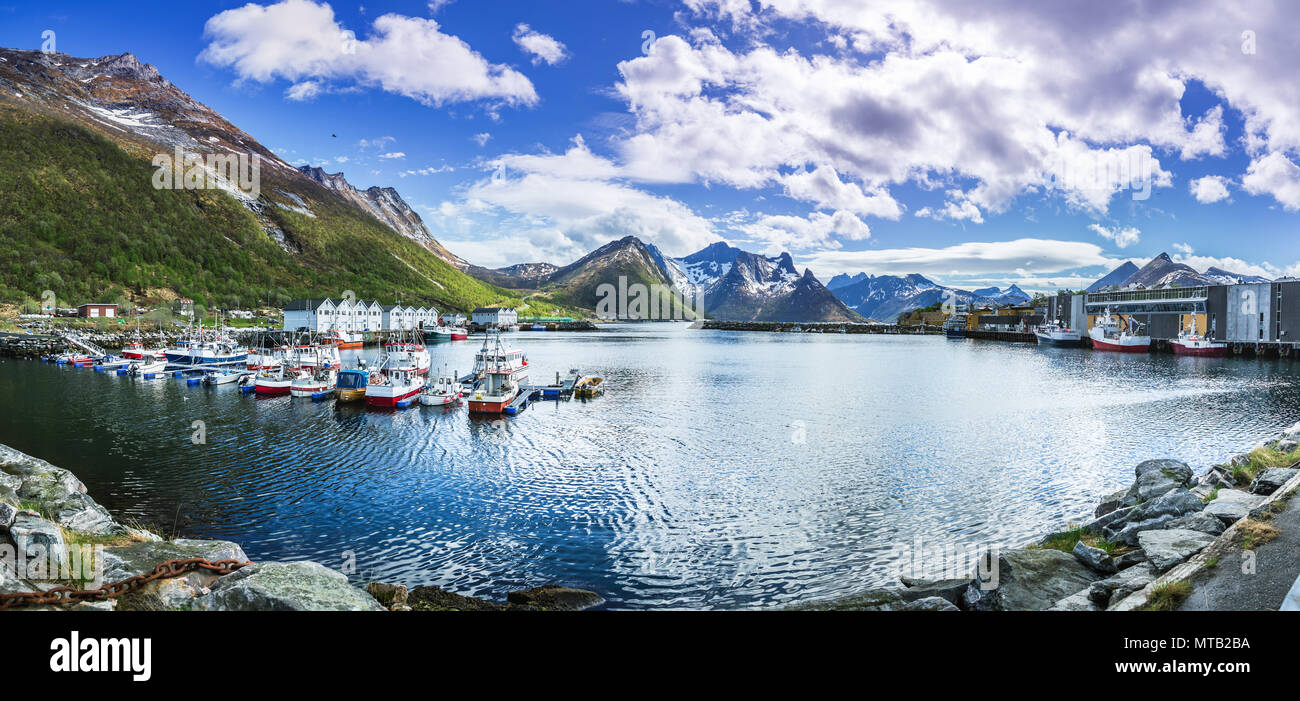 The port of Husoy village on Senja Island beyond the Polar Circle in ...