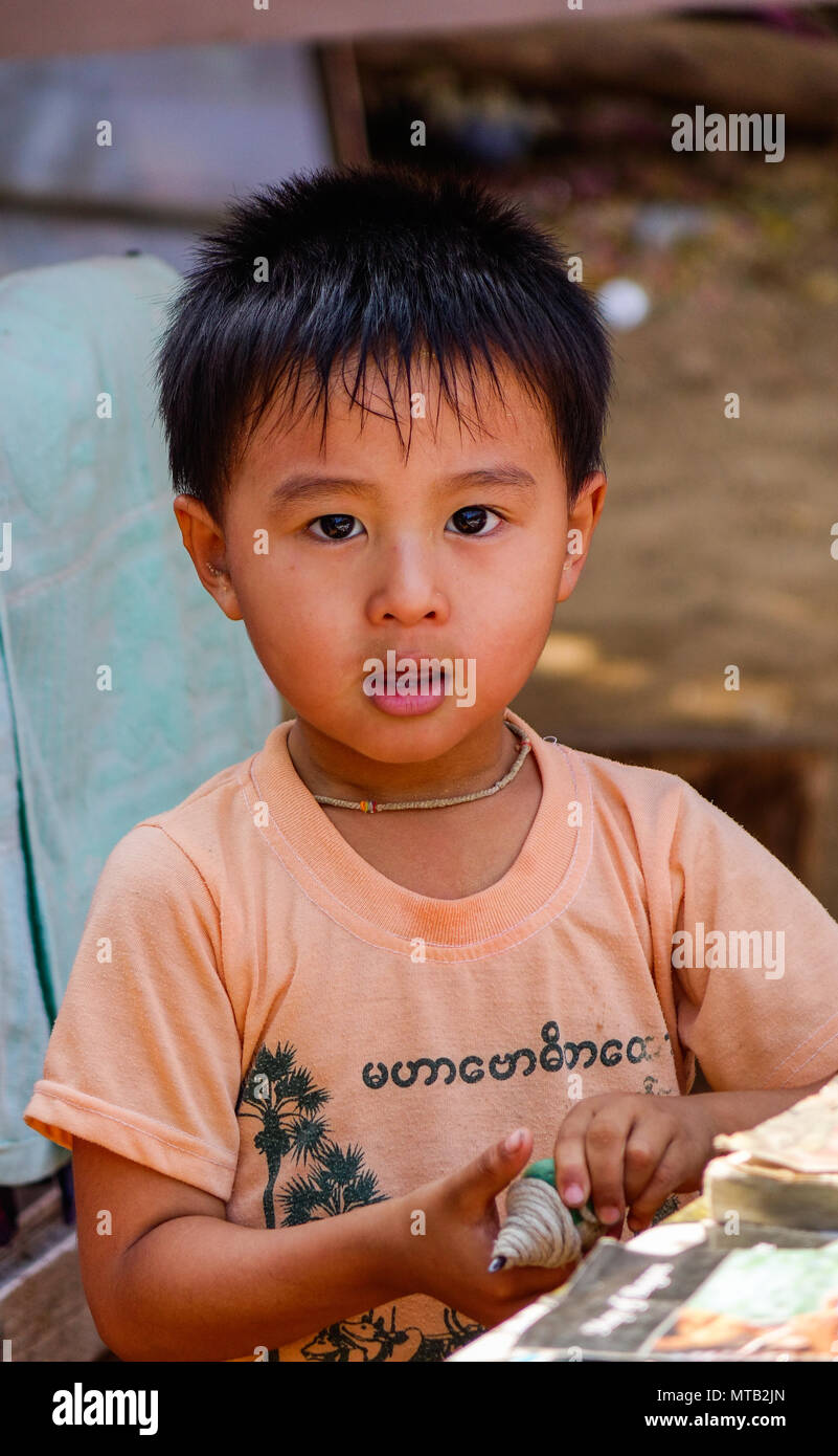 Bagan, Myanmar - Feb 19, 2016. Portrait of Burmese boy at the village in Bagan, Myanmar Stock ...