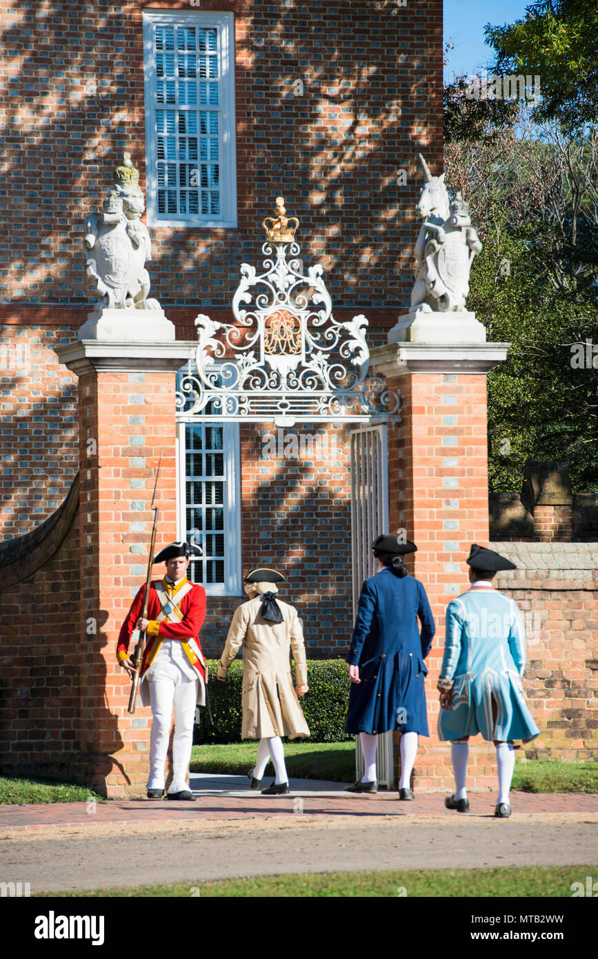 Colonial Williamsburg, the Governor's Palace Gate. A redcoat guard ...