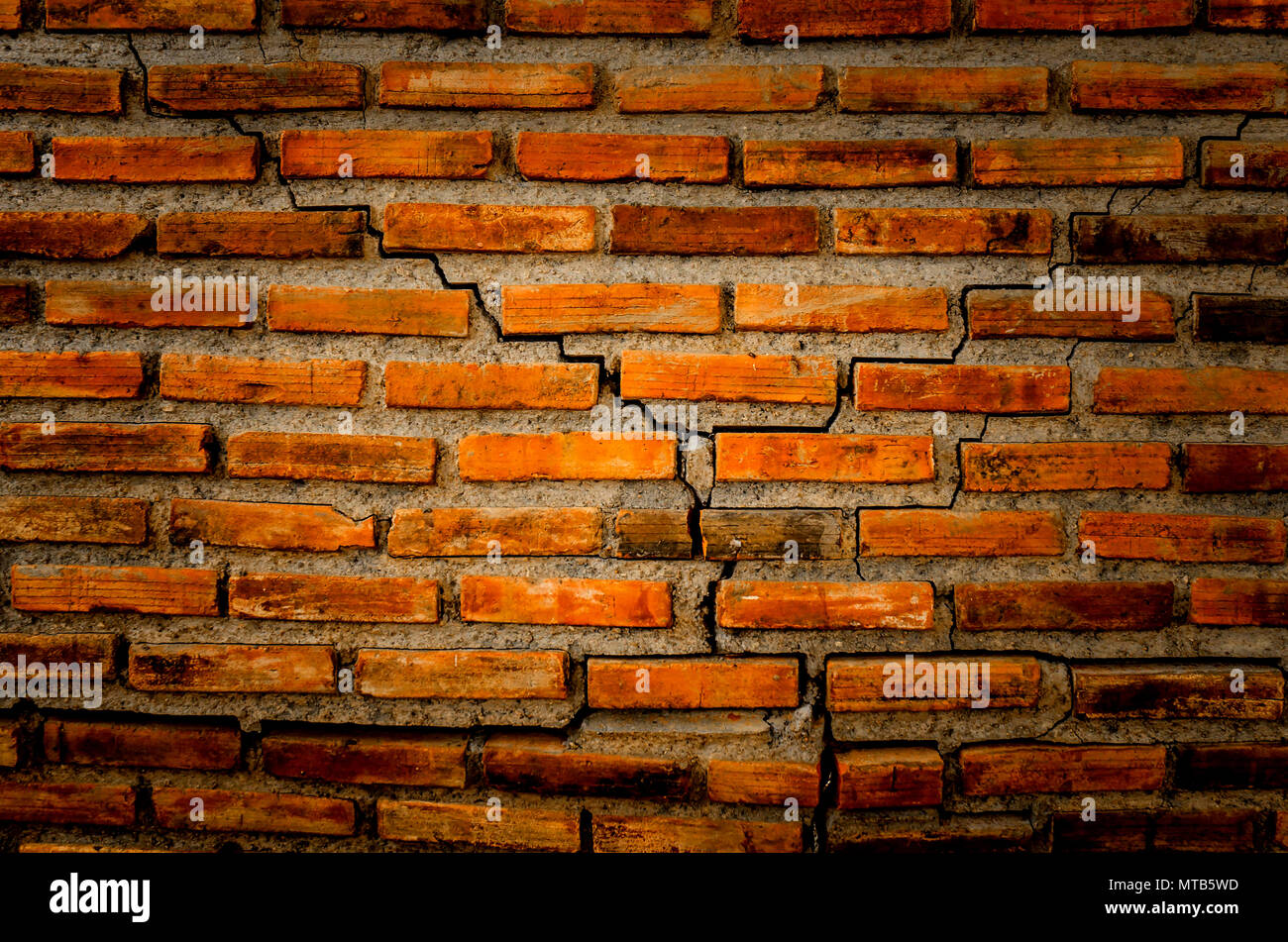 The crack wall from brick and brick background, red crack brick and ...