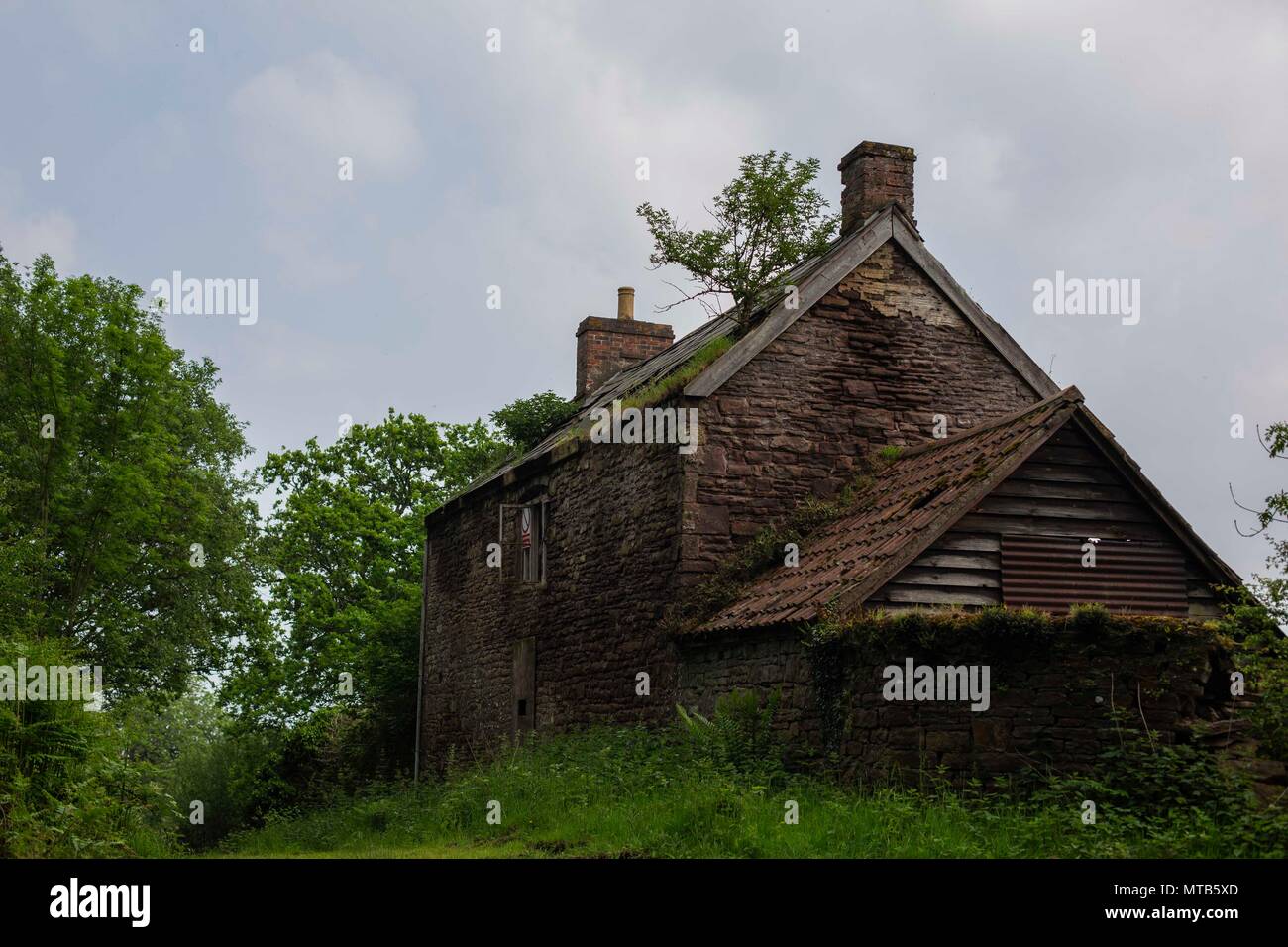 An abandoned derelict farm building in Gloucestershire, UK, May 2018 ...