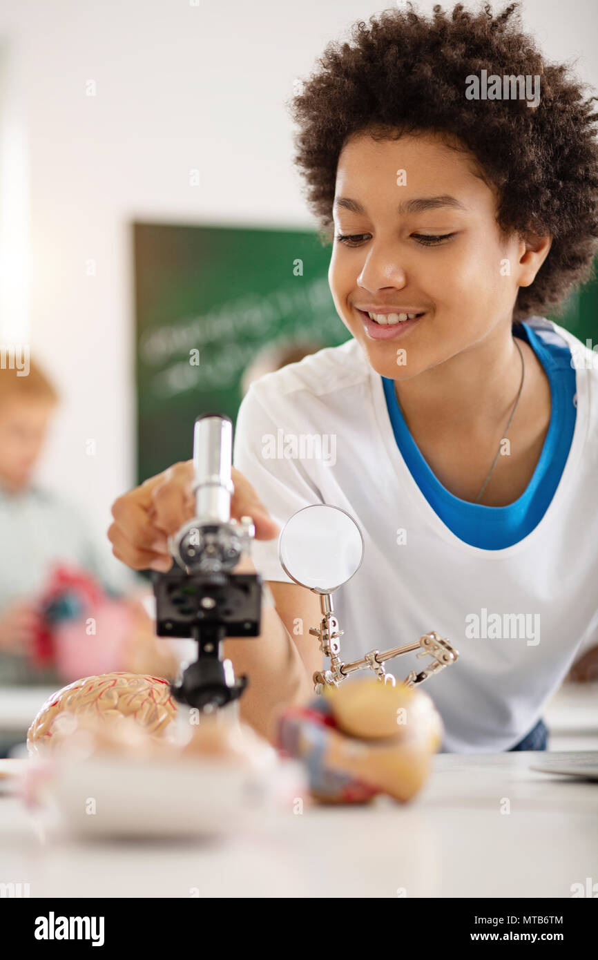 Happy smart teenager studying Stock Photo - Alamy