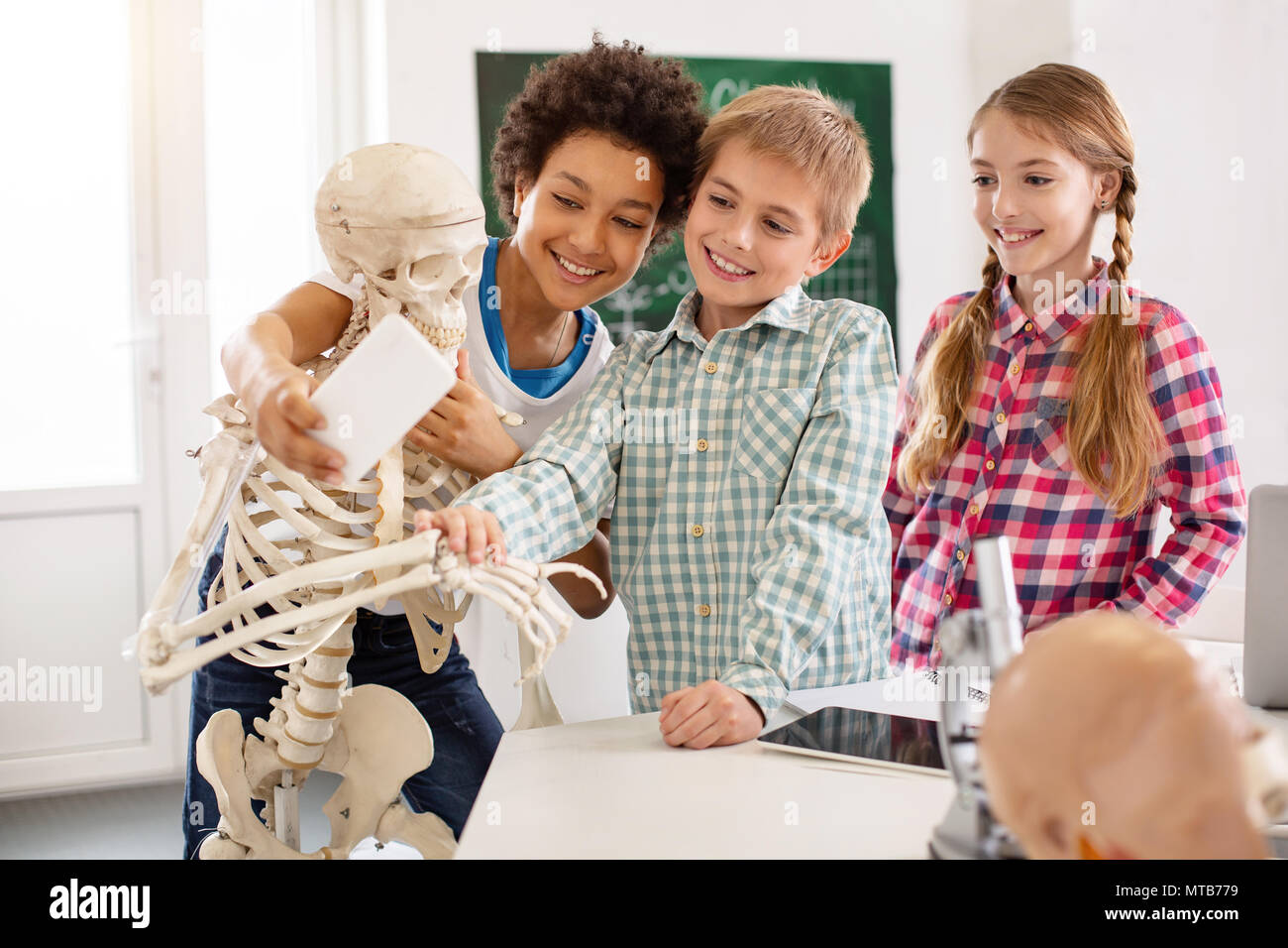 Happy nice children having fun Stock Photo - Alamy