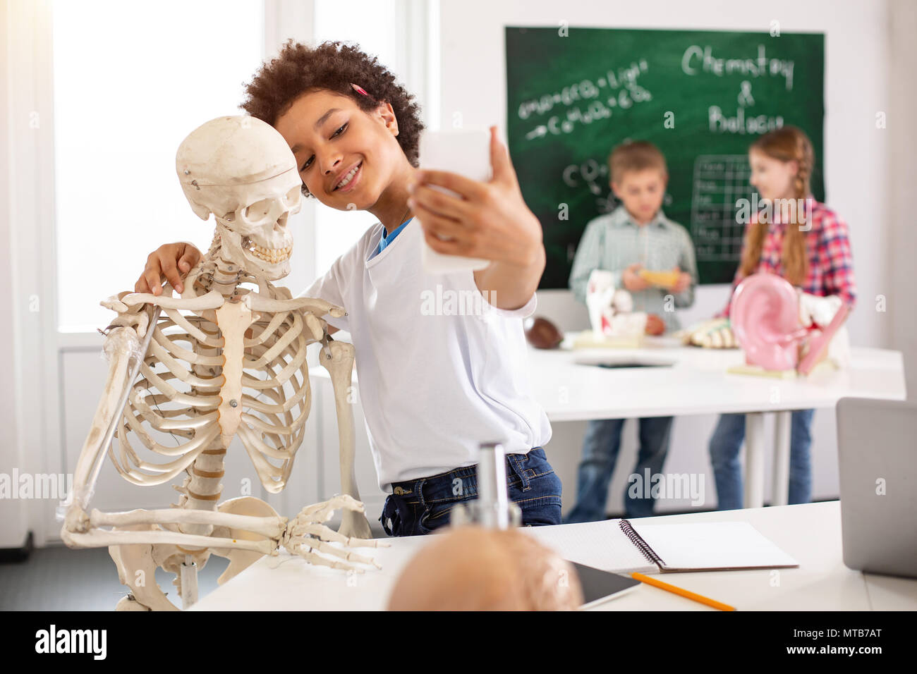 Cheerful nice boy taking selfies Stock Photo - Alamy Cheerful nice boy taking selfies Stock Photo - Alamy