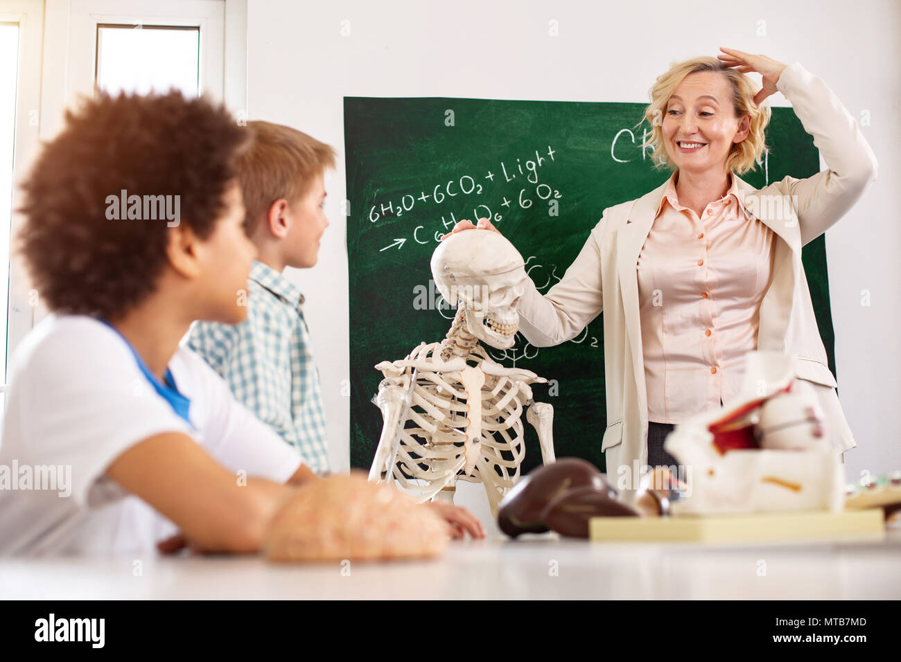 Teacher and blackboard hi-res stock photography and images - Alamy