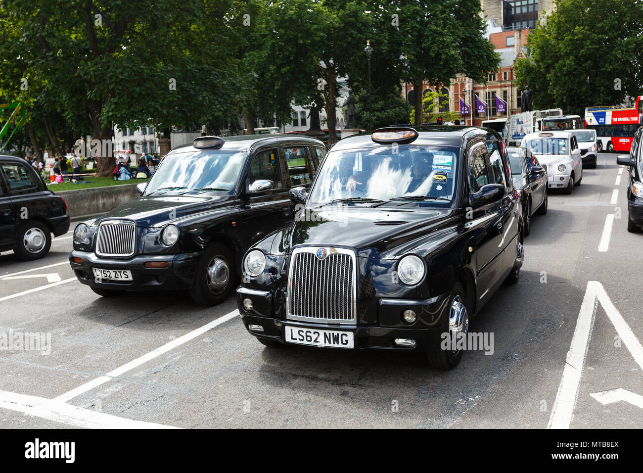 Legendary London taxi cab on the streets of London Stock Photo - Alamy