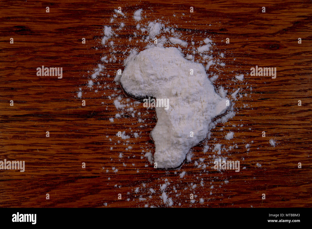 Shape of African continent covered with a fine white powder - Africa is ...