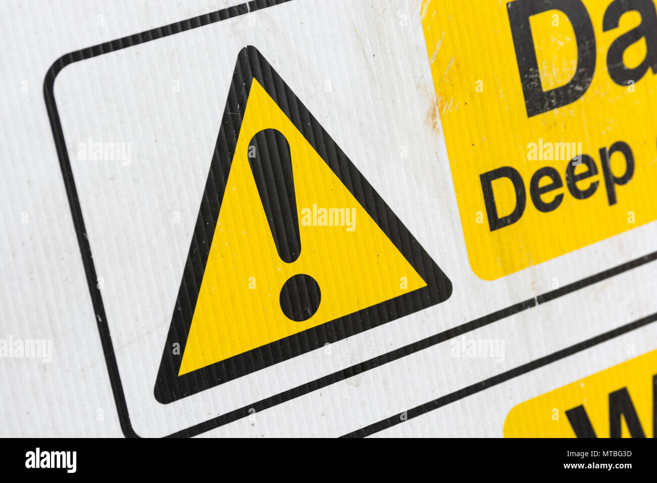 Yellow 'Health and Safety' site safety danger warning sign on a small ...