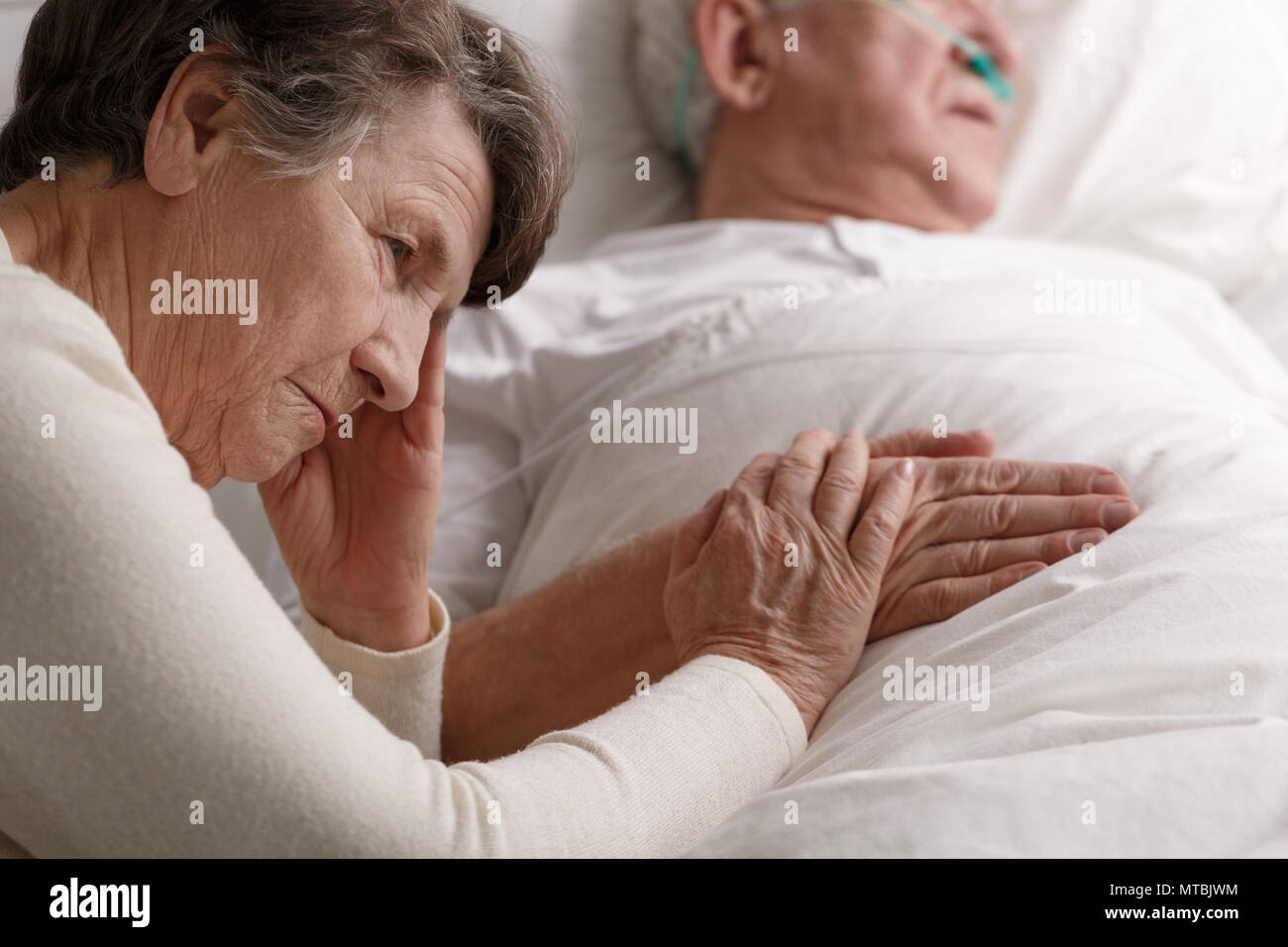 Dying man bed family hi-res stock photography and images - Alamy