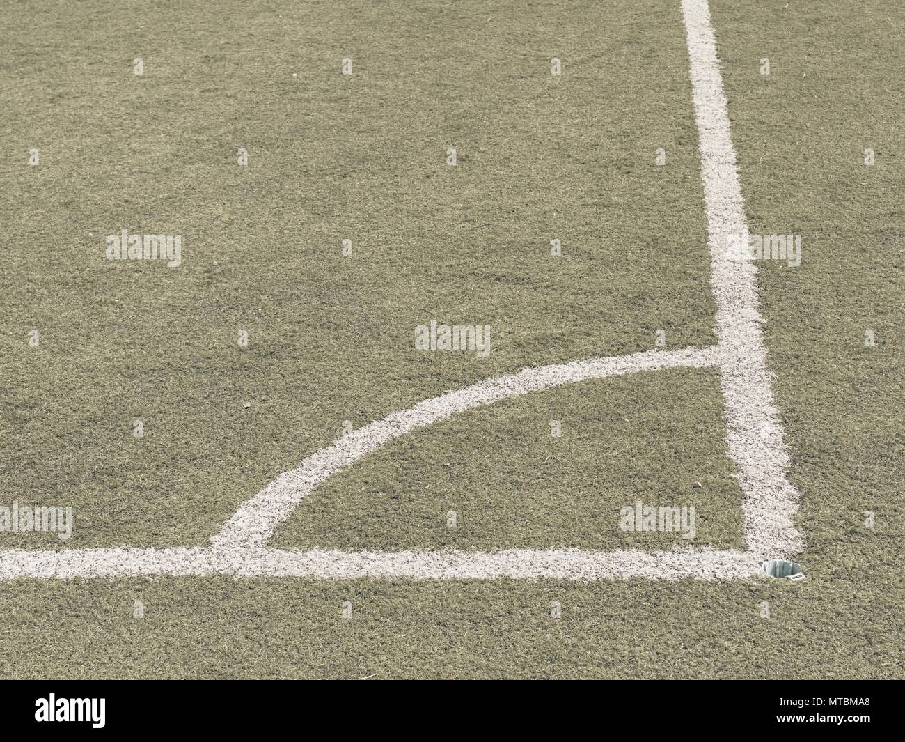 Play field corner, green grass texture of football or soccer field ...