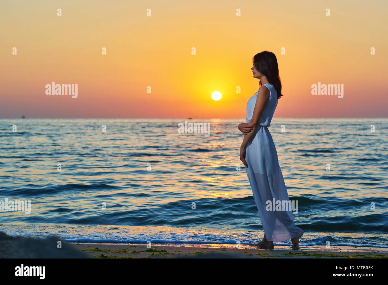Woman Walking Beach Alone Dress High Resolution Stock Photography and ...