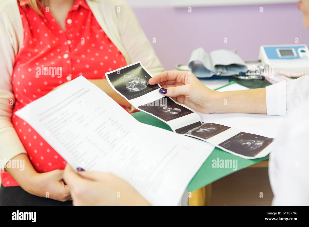 Young pregnant woman check up at doctors office Stock Photo - Alamy
