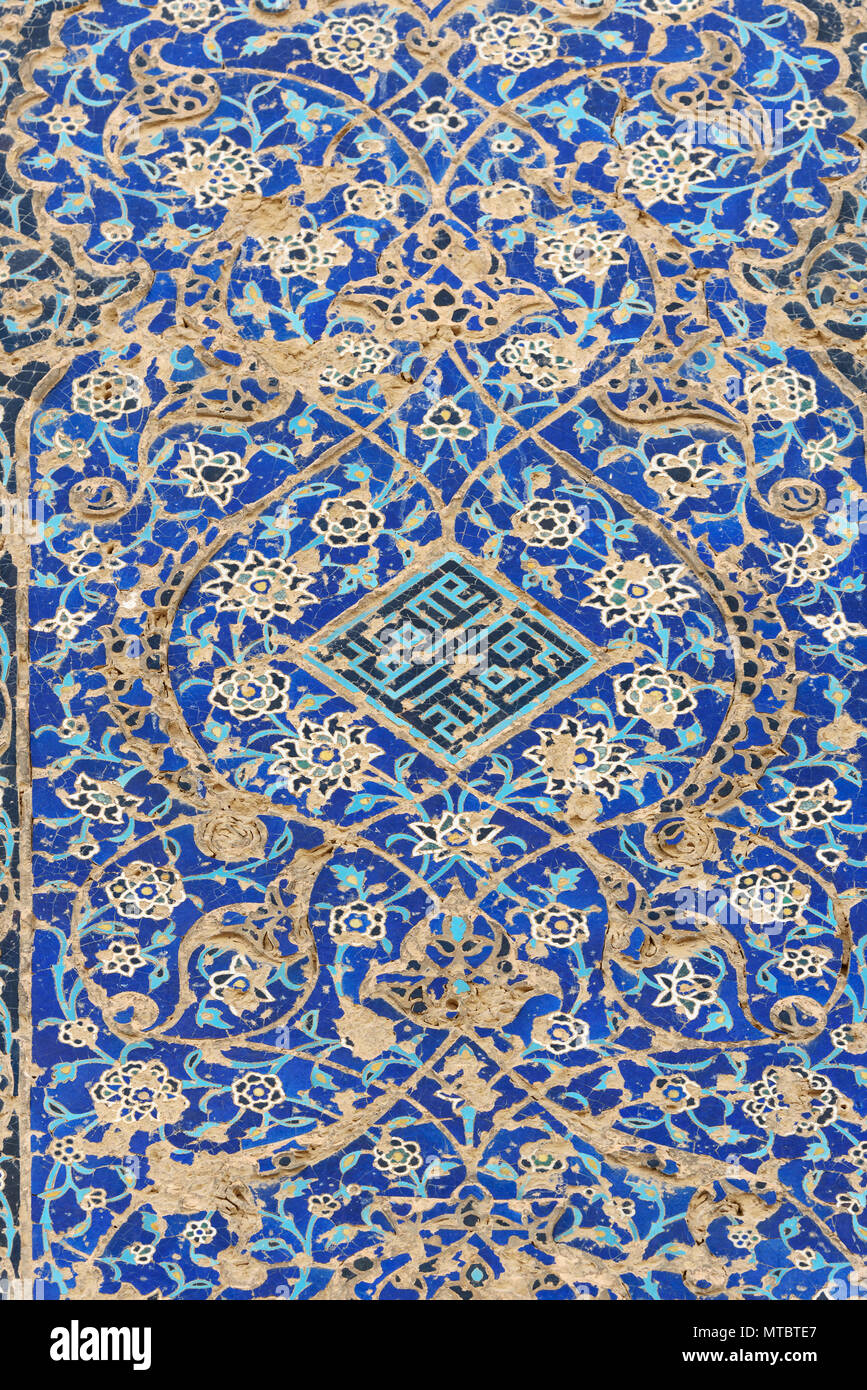 Remains of the decorated blue mosaic tiles on the wall of entrance to ...