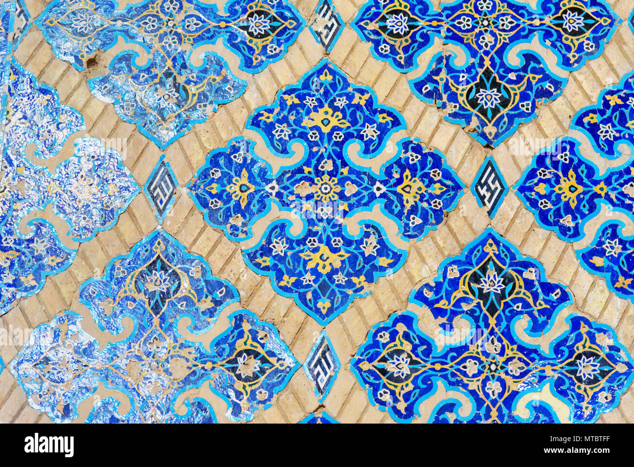 Remains of the decorated blue mosaic tiles on the wall inside of Blue ...